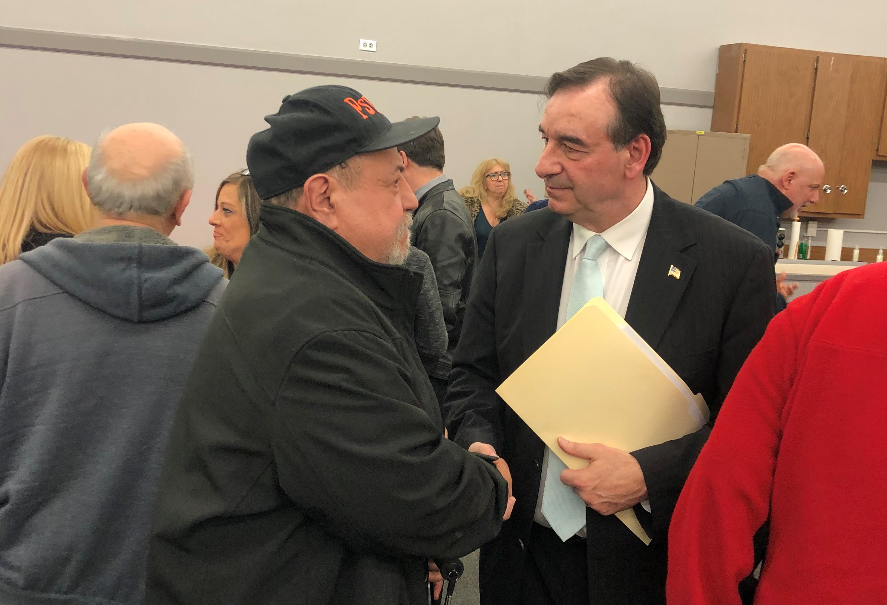 Chairman Zisa Heads off Trolls at Candidates' Forum